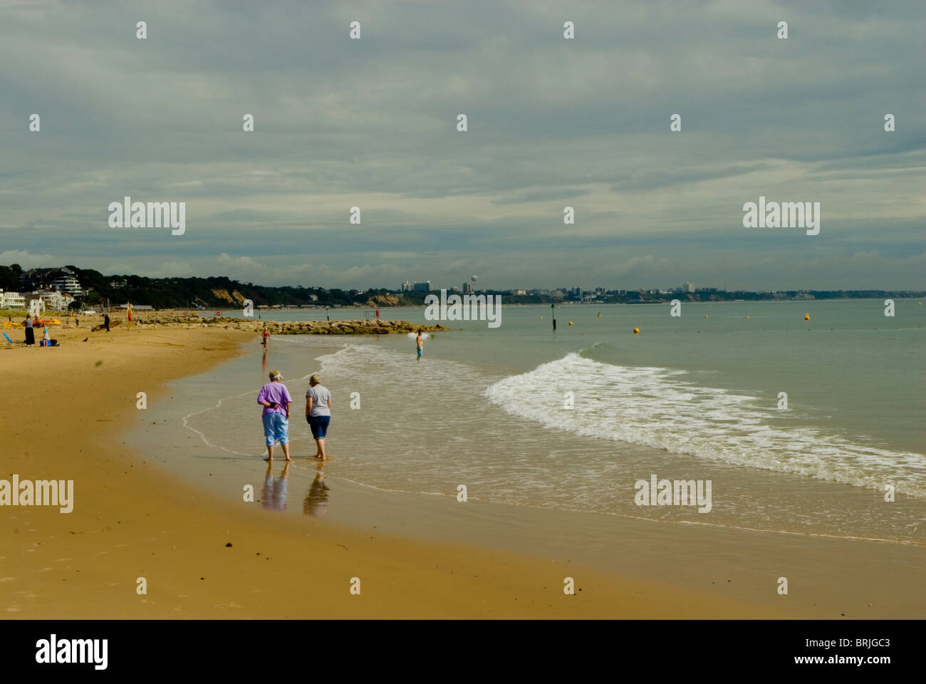 Poole beach with Bournemouth Dorset England in background Stock Photo ...