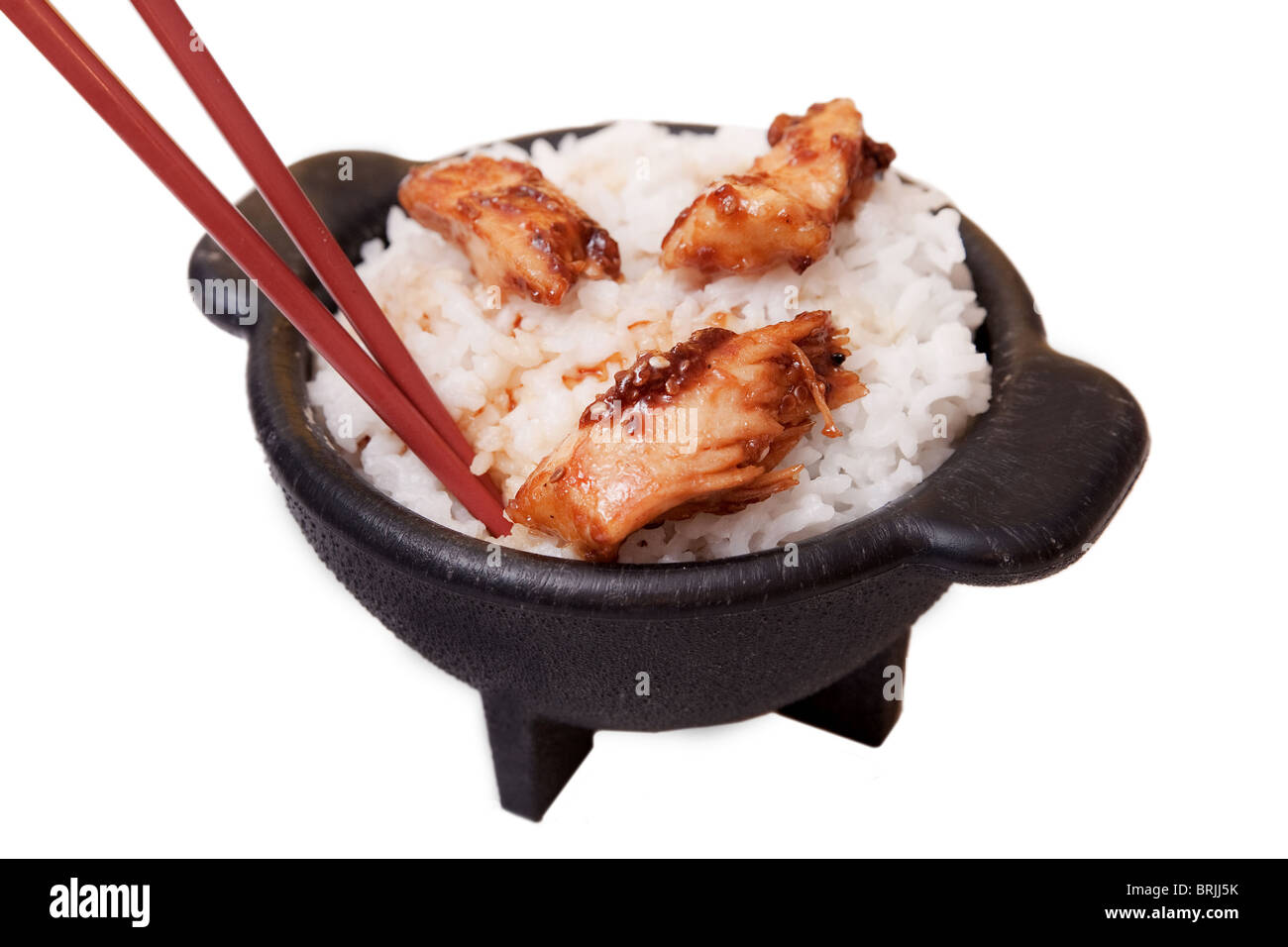 one bowl of homemade healthy sesame chicken over white rice with ...