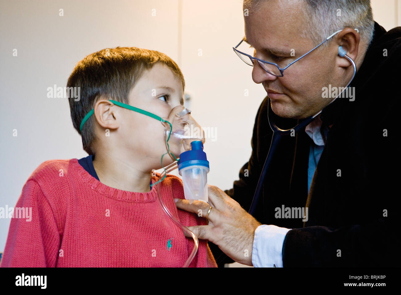 Boy receiving oxygen treatment Stock Photo - Alamy