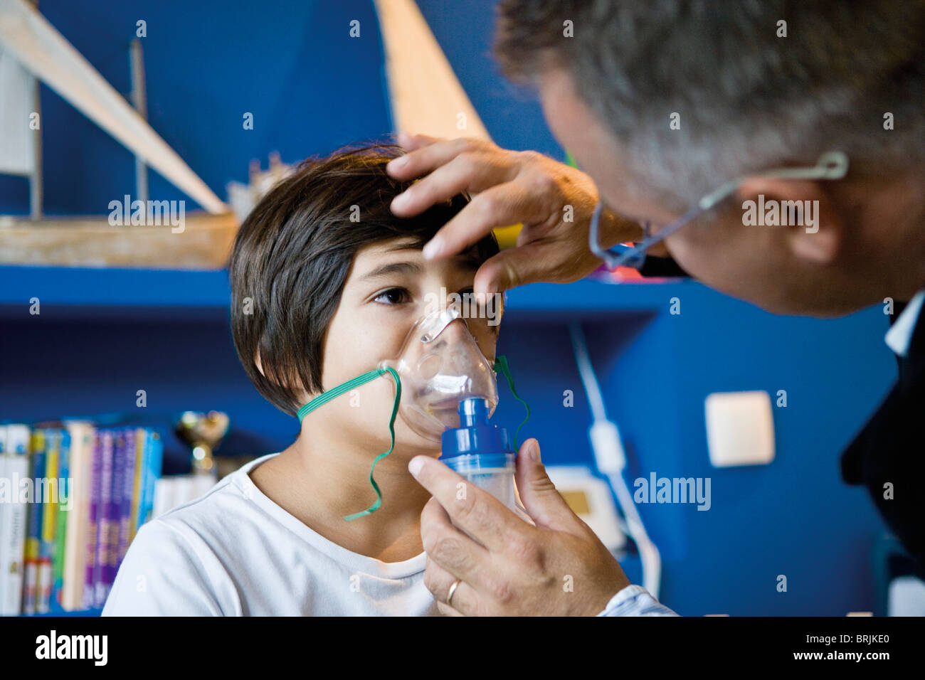 Boy receiving oxygen treatment Stock Photo - Alamy