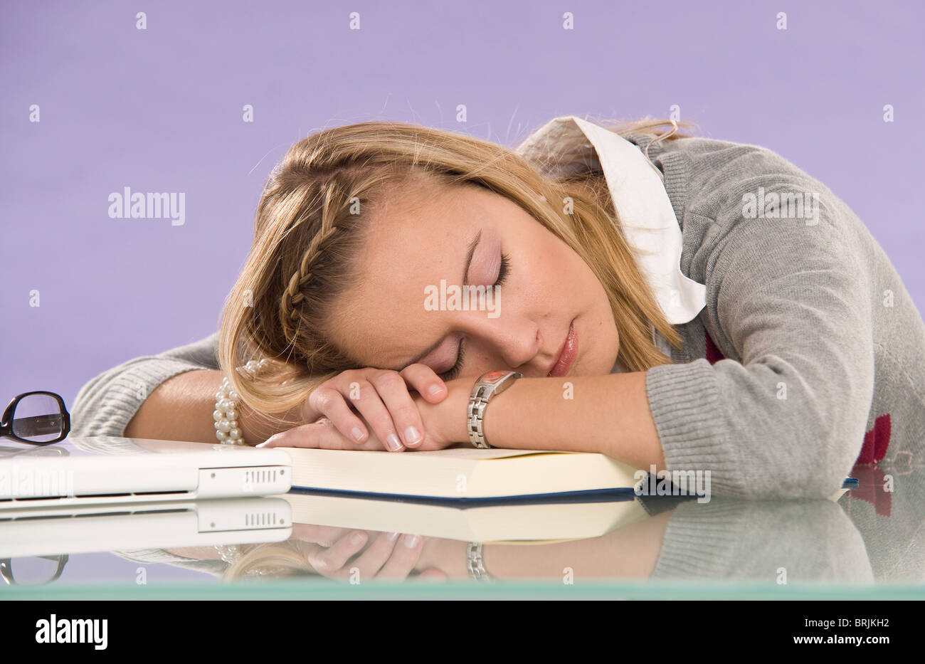 Woman Falling Asleep at Desk Stock Photo - Alamy