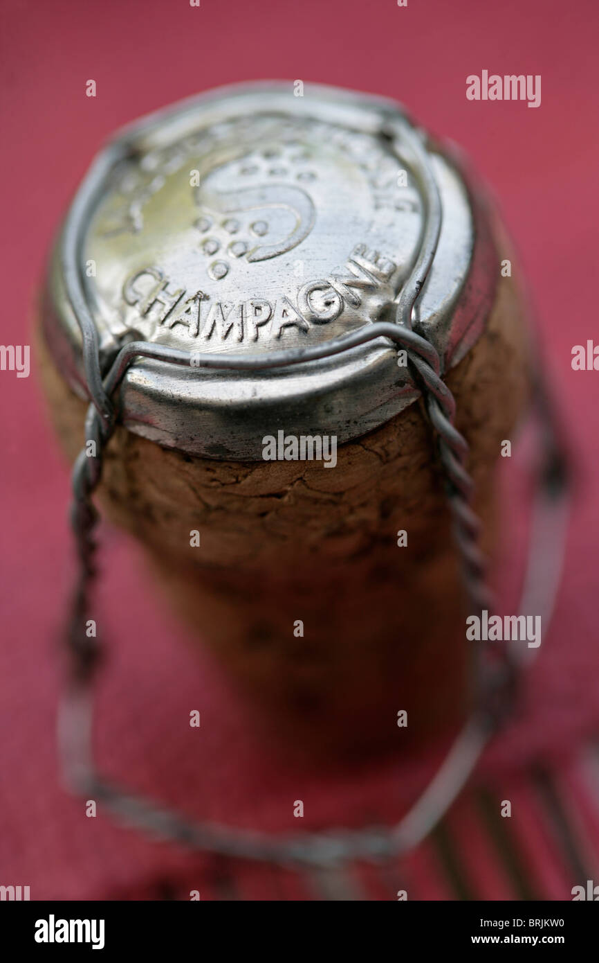Wire cage with cap on champagne cork, close-up Stock Photo - Alamy