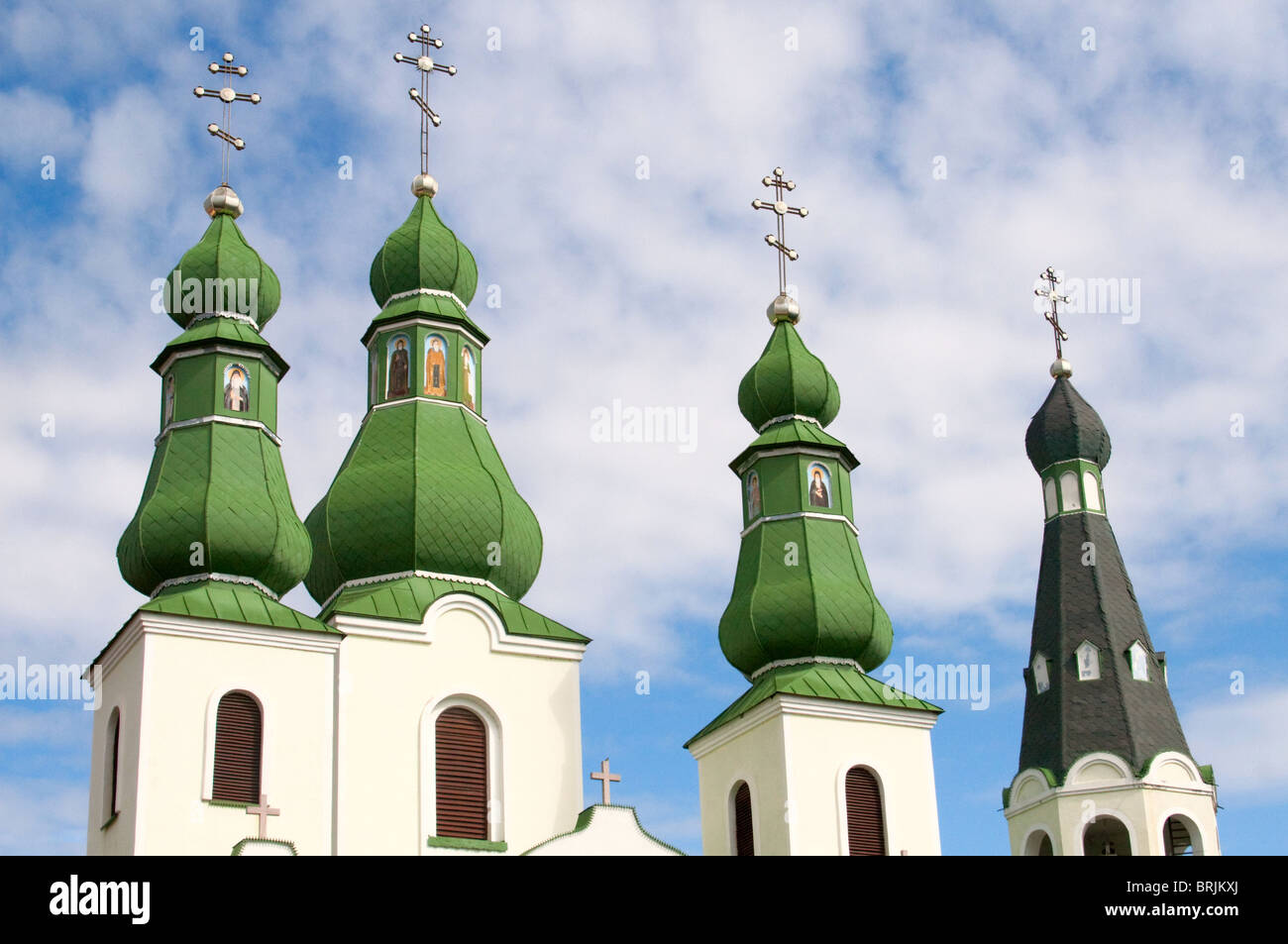 Domes of Orthodox temple on a blue sky background Stock Photo - Alamy