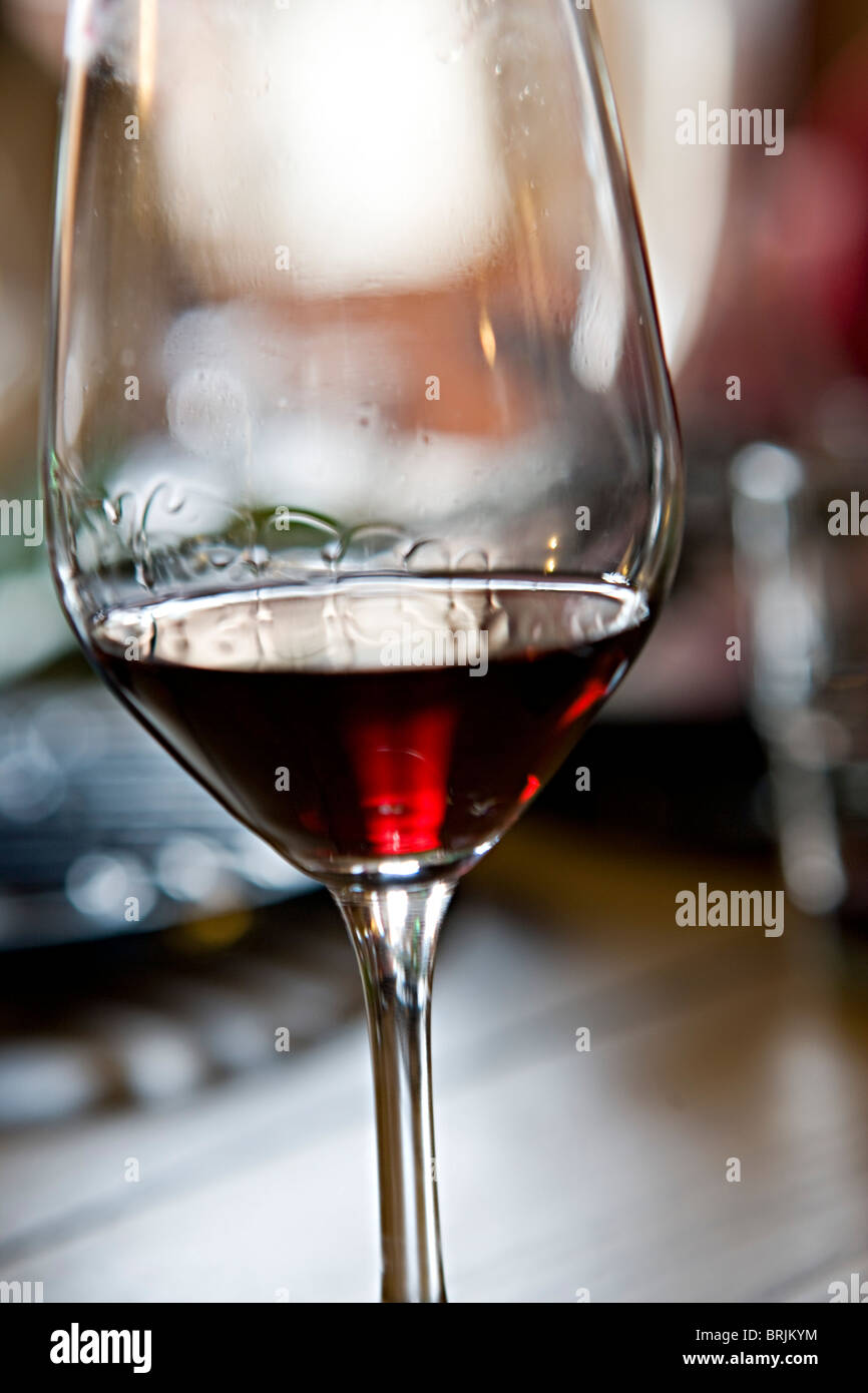 Tears of wine on glass of red wine Stock Photo - Alamy