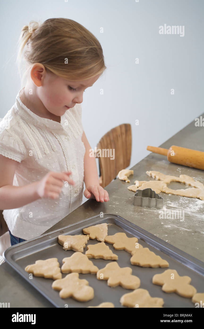 Little Girl Baking Christmas Cookies Stock Photo - Alamy