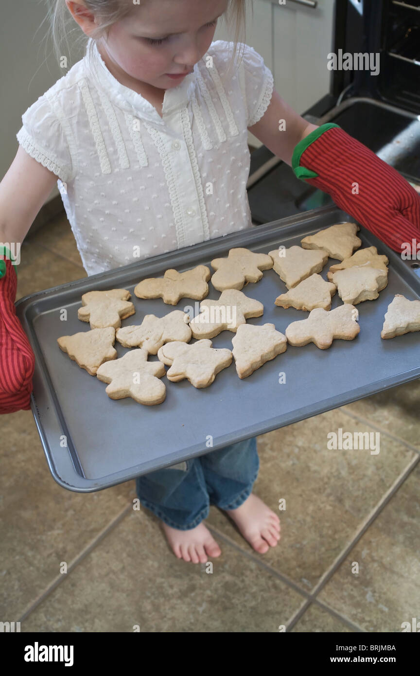 Little Girl Baking Christmas Cookies Stock Photo - Alamy