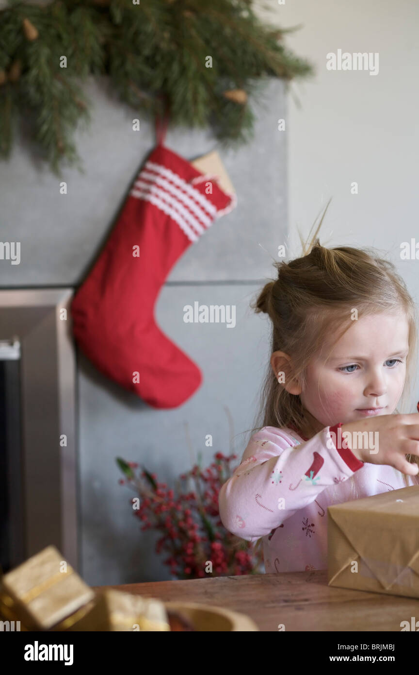 Little Girl Opening Christmas Presents Stock Photo - Alamy