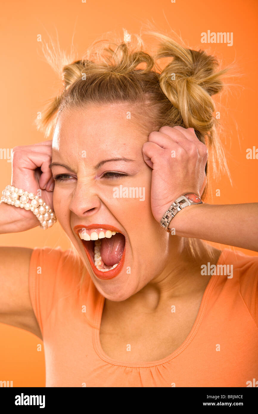 Closeup angry young woman yelling hi-res stock photography and images ...