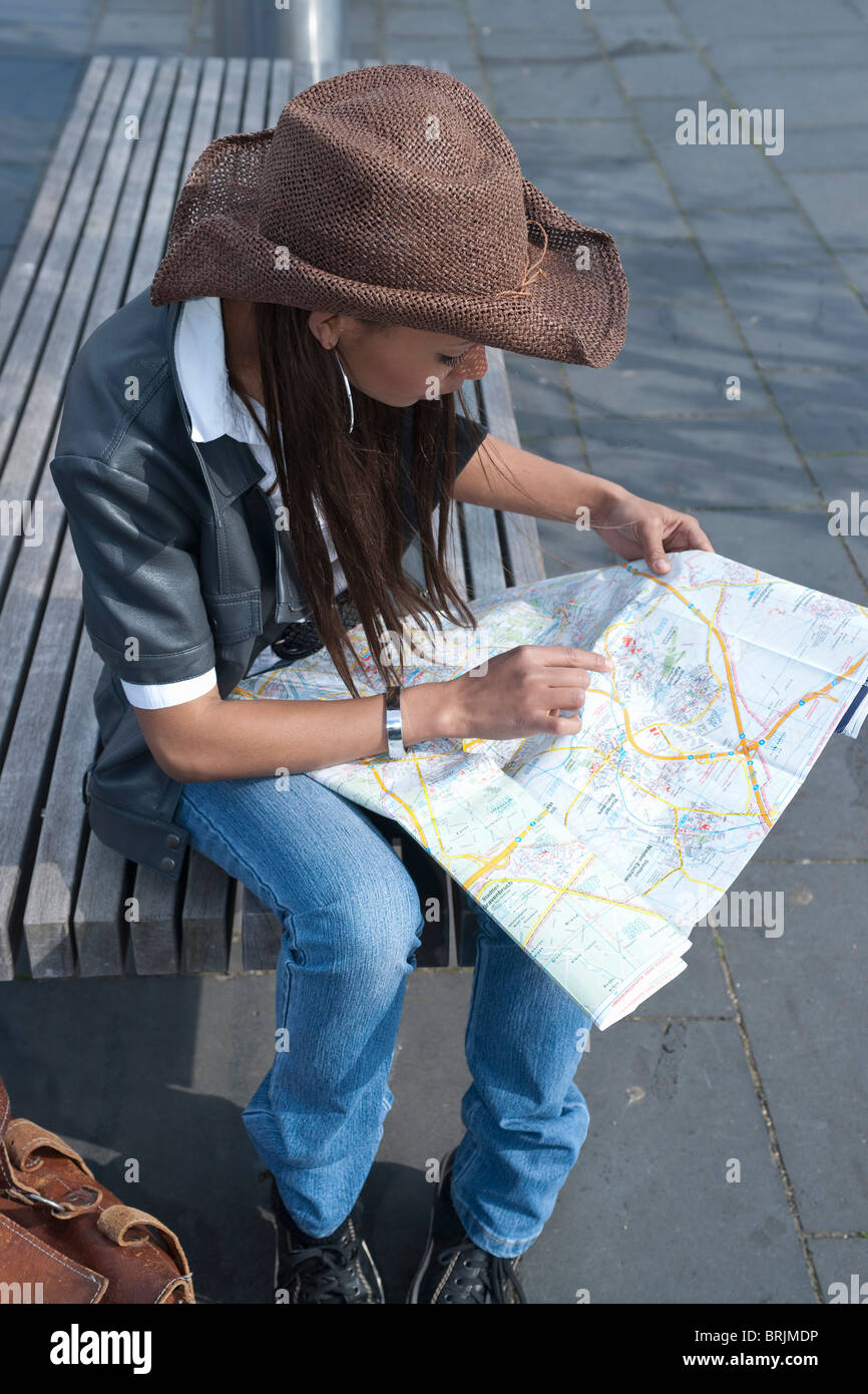 Woman Looking at Map Stock Photo - Alamy