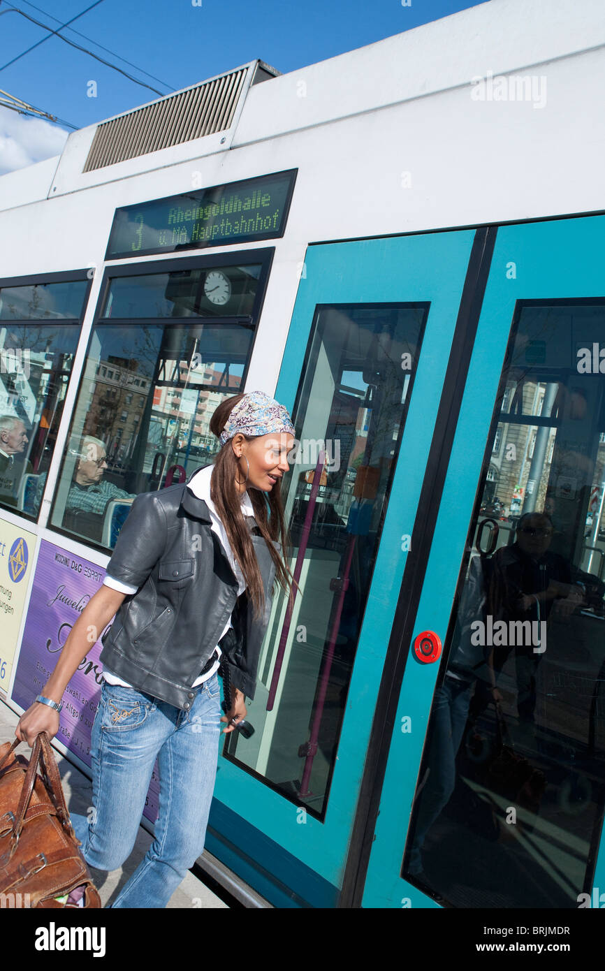 Woman taking Transit Stock Photo - Alamy
