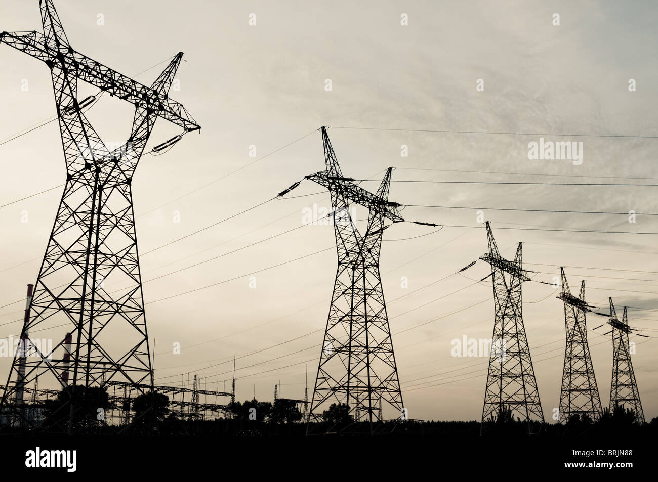 Transmission power line an power plant Stock Photo - Alamy