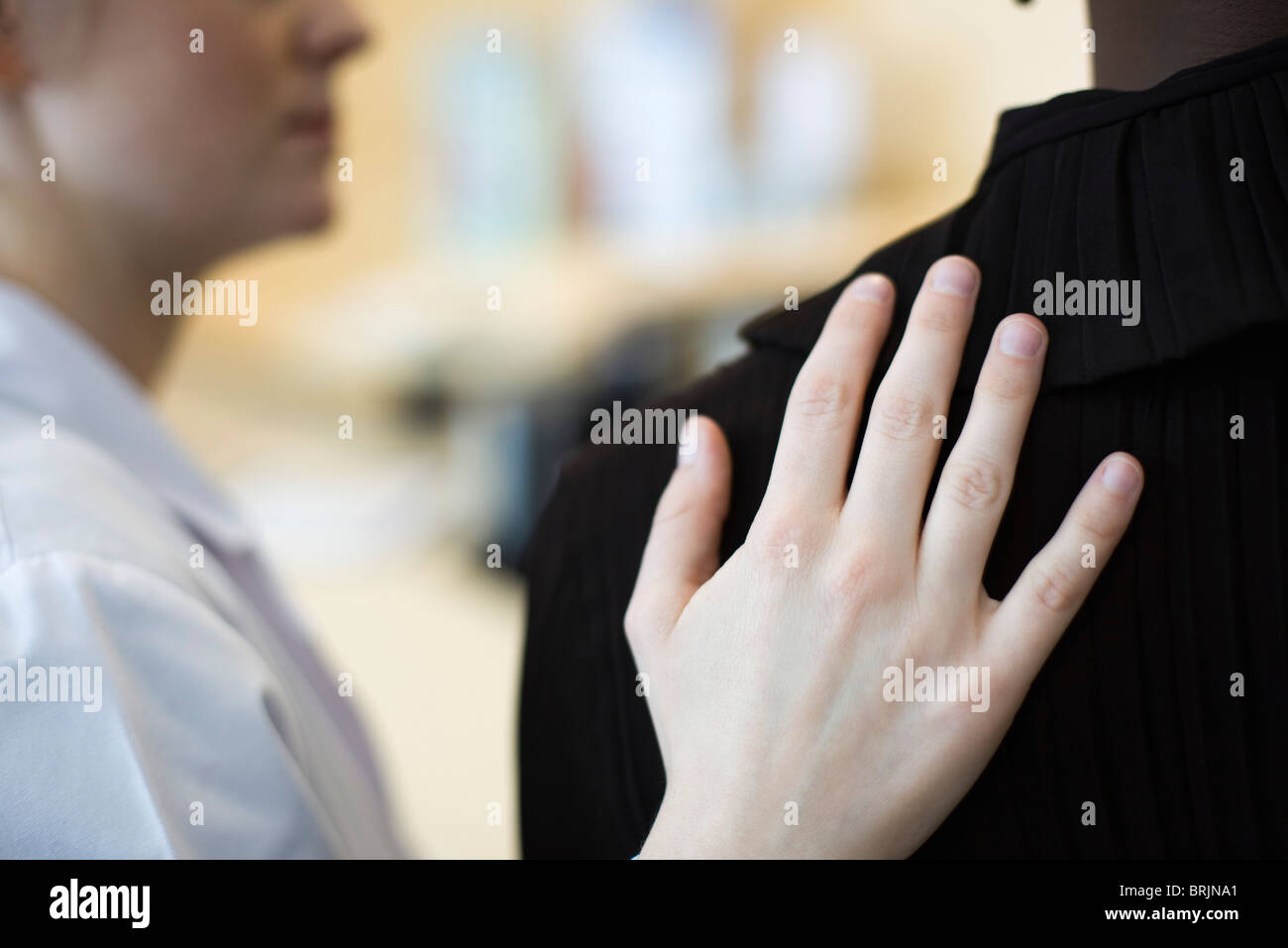 Hand on shoulder support comfort hi-res stock photography and images ...