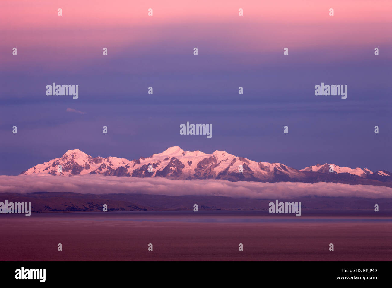 the Cordillera Real in the Andes from Lake Titicaca at dusk, Bolivia ...