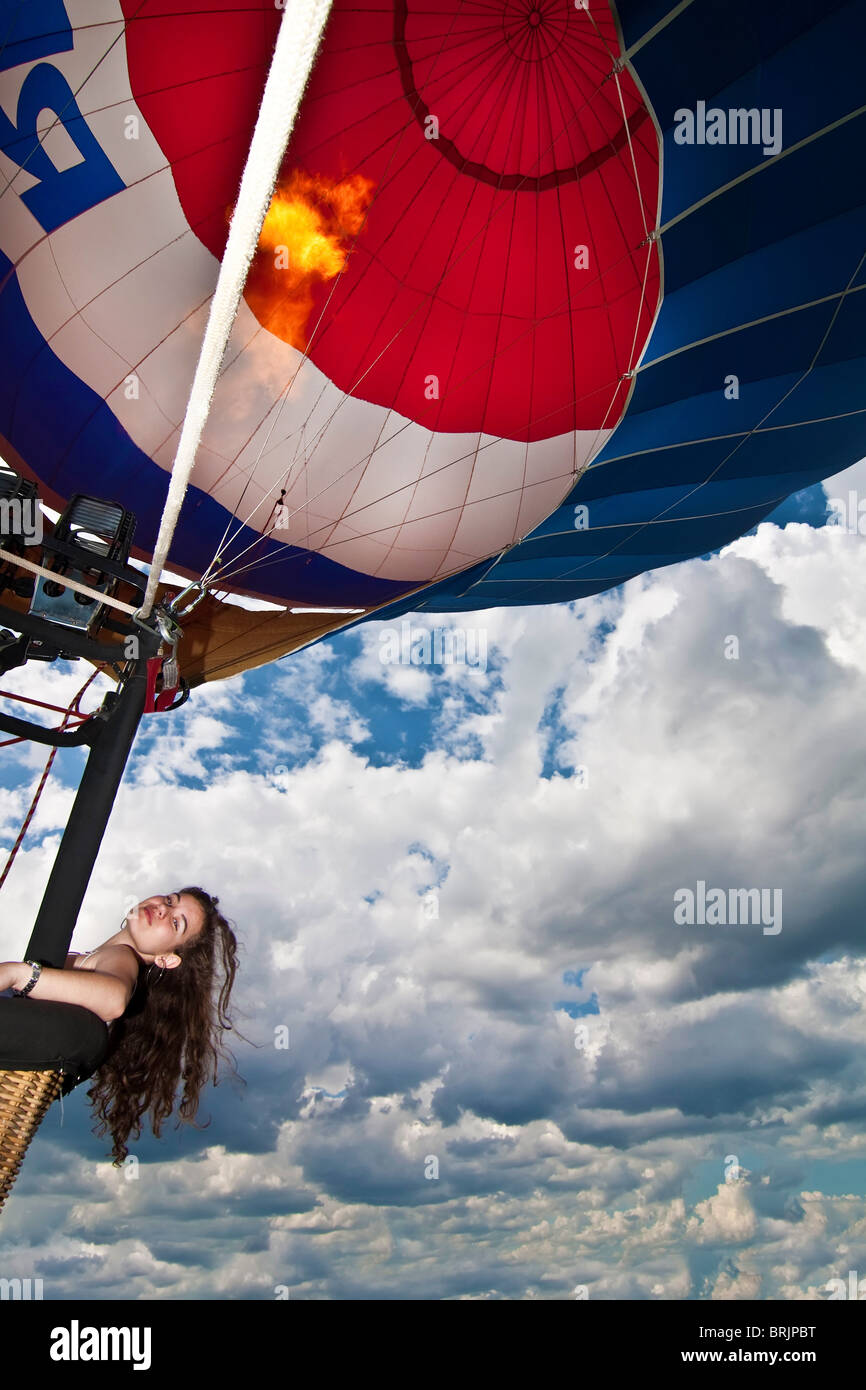 Girl in a hot air balloon just seconds before launching Stock Photo - Alamy