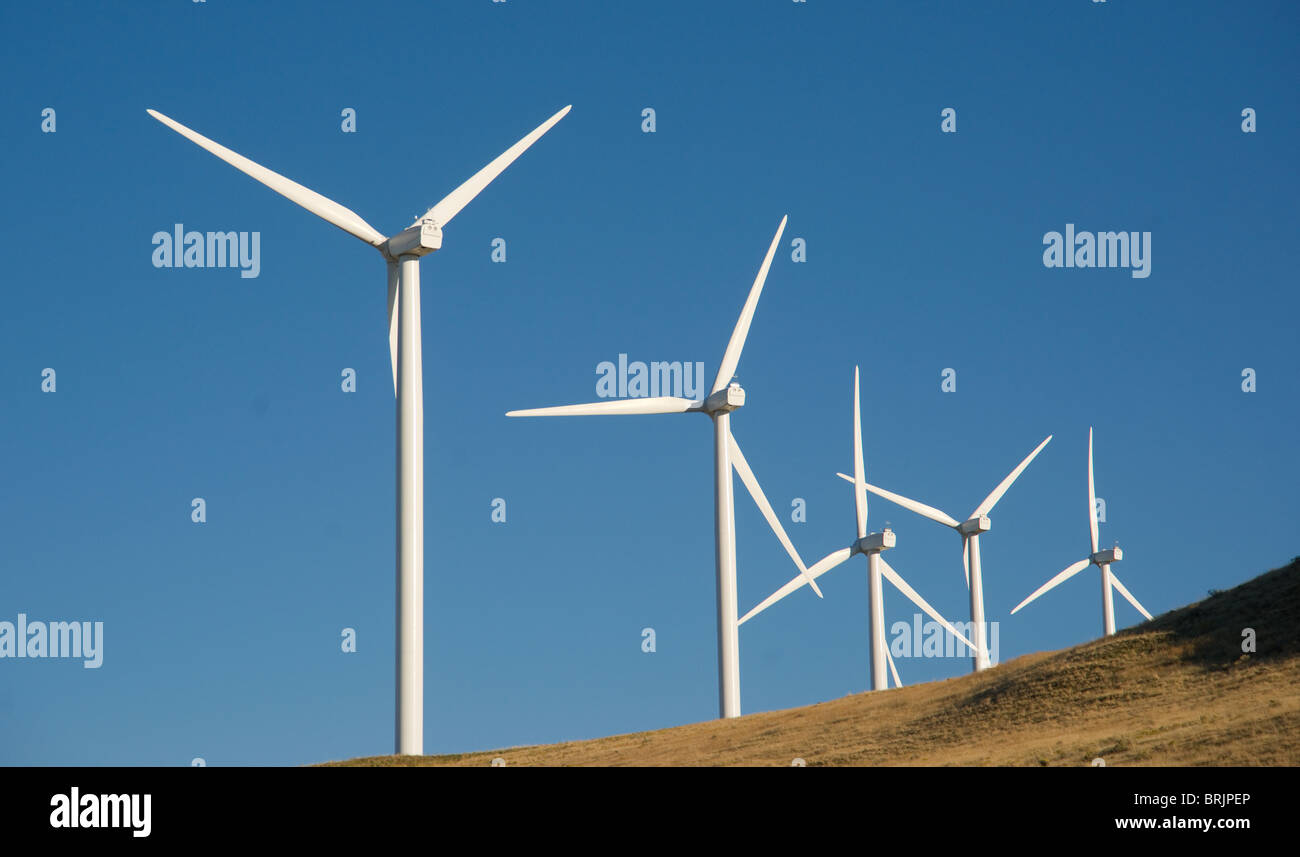 Alternative green energy rotary wind turbines on the hillside Stock ...