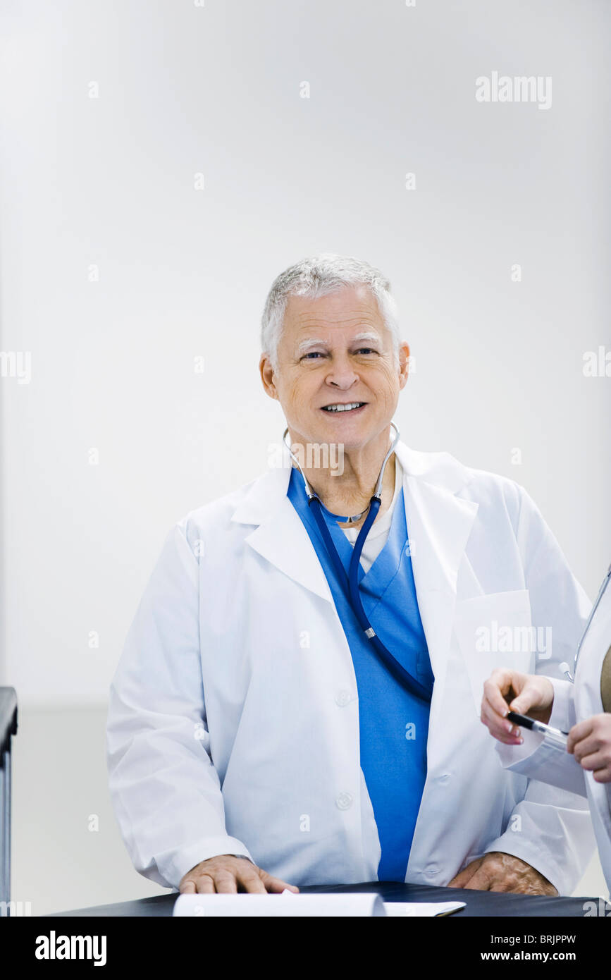 Doctor smiling, portrait Stock Photo - Alamy