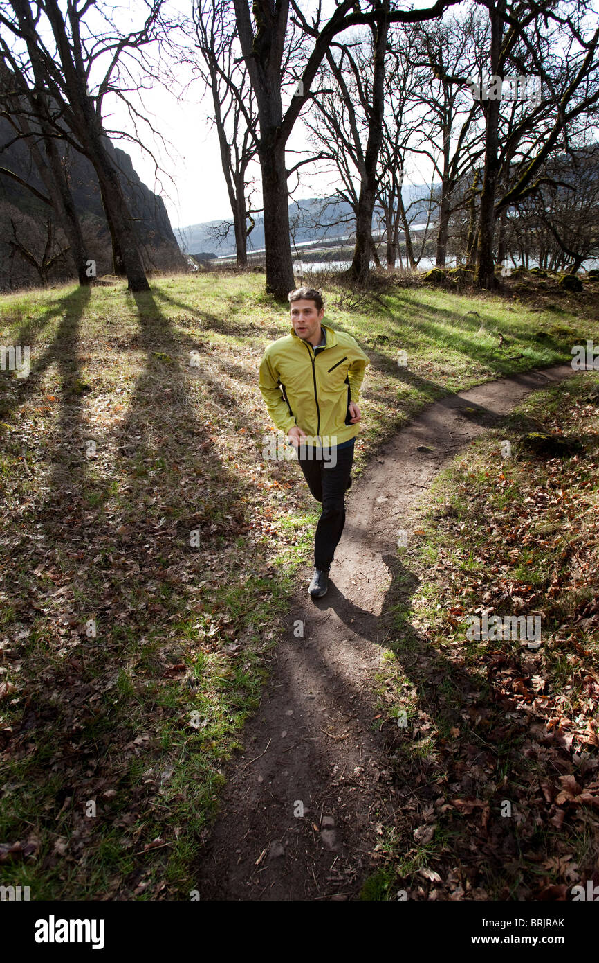 A fit man out trail running Stock Photo - Alamy