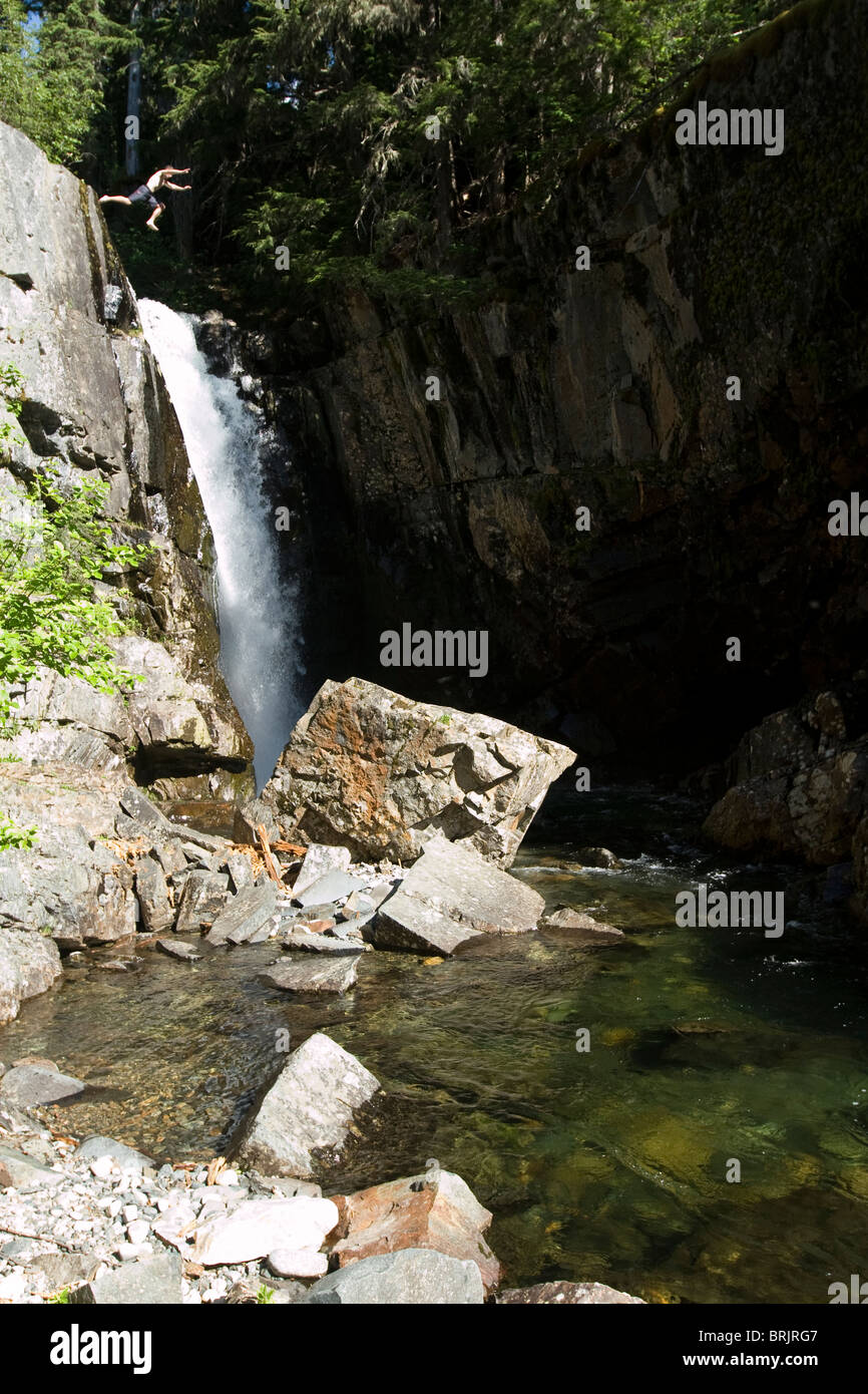 Man jumping off rock hi-res stock photography and images - Alamy