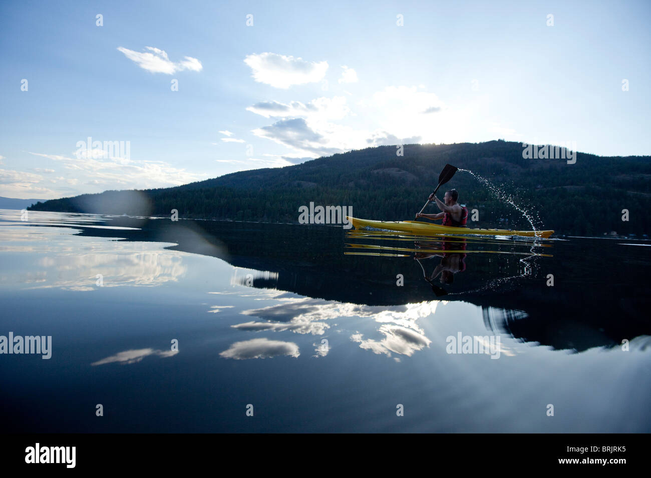 Yellow kayak on lake hi-res stock photography and images - Alamy