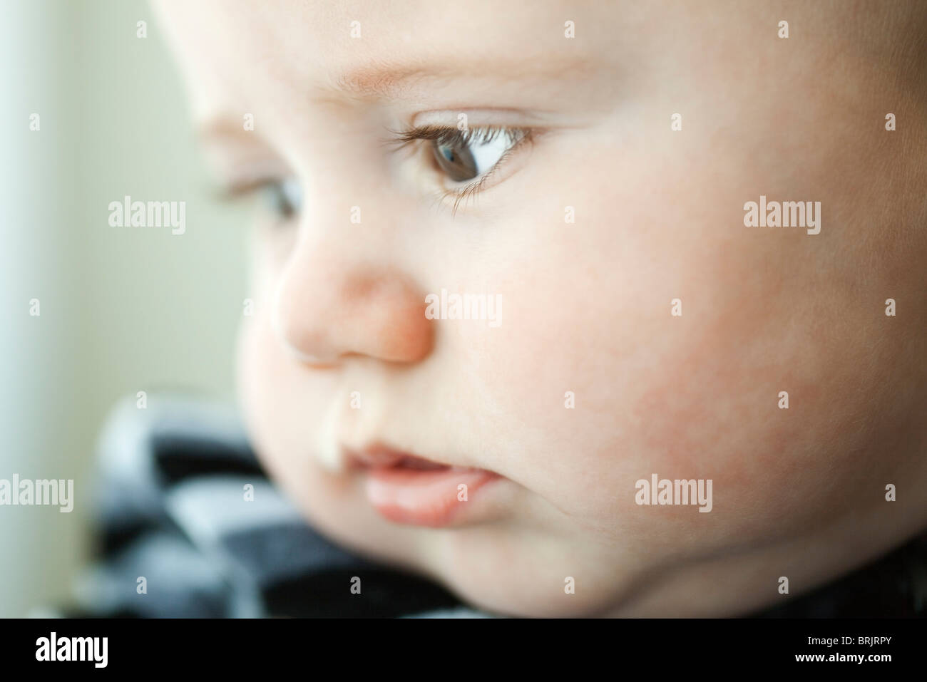 Cheek to cheek looking away innocence childhood hi-res stock ...