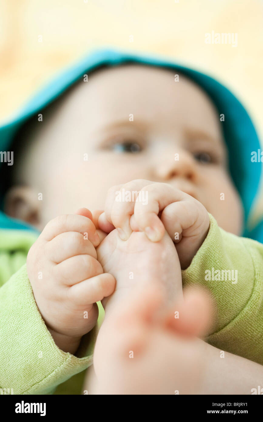 Boy touching toes hi-res stock photography and images - Alamy