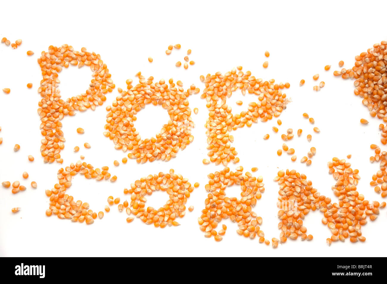 Bright corn kernels forming words "pop corn Stock Photo - Alamy