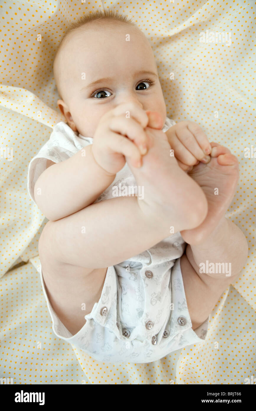 Boy touching toes hi-res stock photography and images - Alamy
