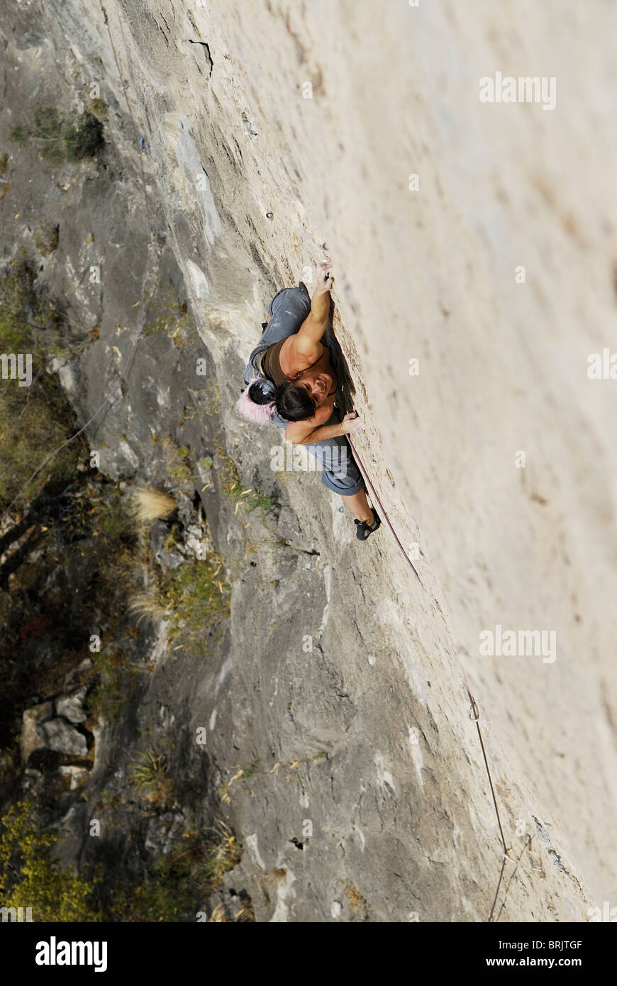 A rock climber ascends a steep rock face in Mexico Stock Photo - Alamy