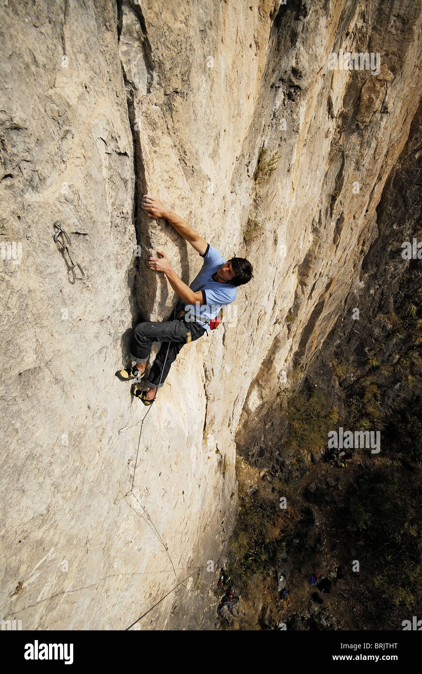 A rock climber ascends a steep rock face in Mexico Stock Photo - Alamy