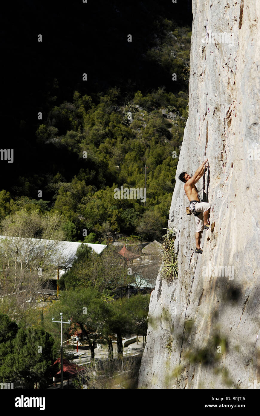 A rock climber ascends a steep rock face in Mexico Stock Photo - Alamy