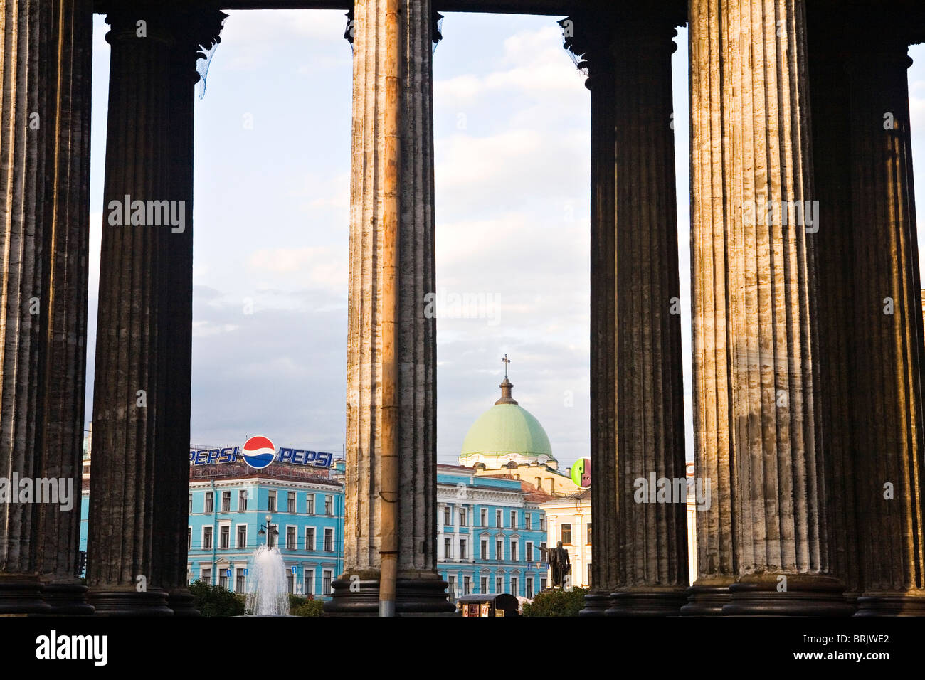 Pepsi sign and green dome of Catholic Church on Nevsky Prospect through ...