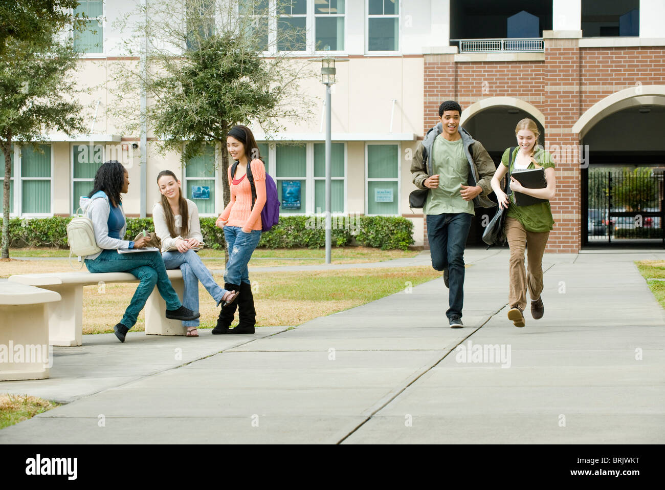 Friends Walking Together At School