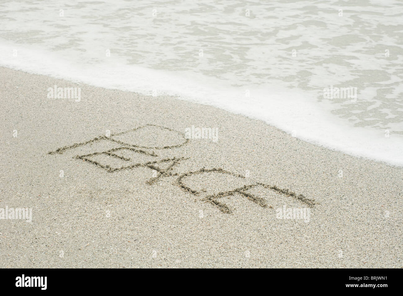 Word peace written in sand hi-res stock photography and images - Alamy