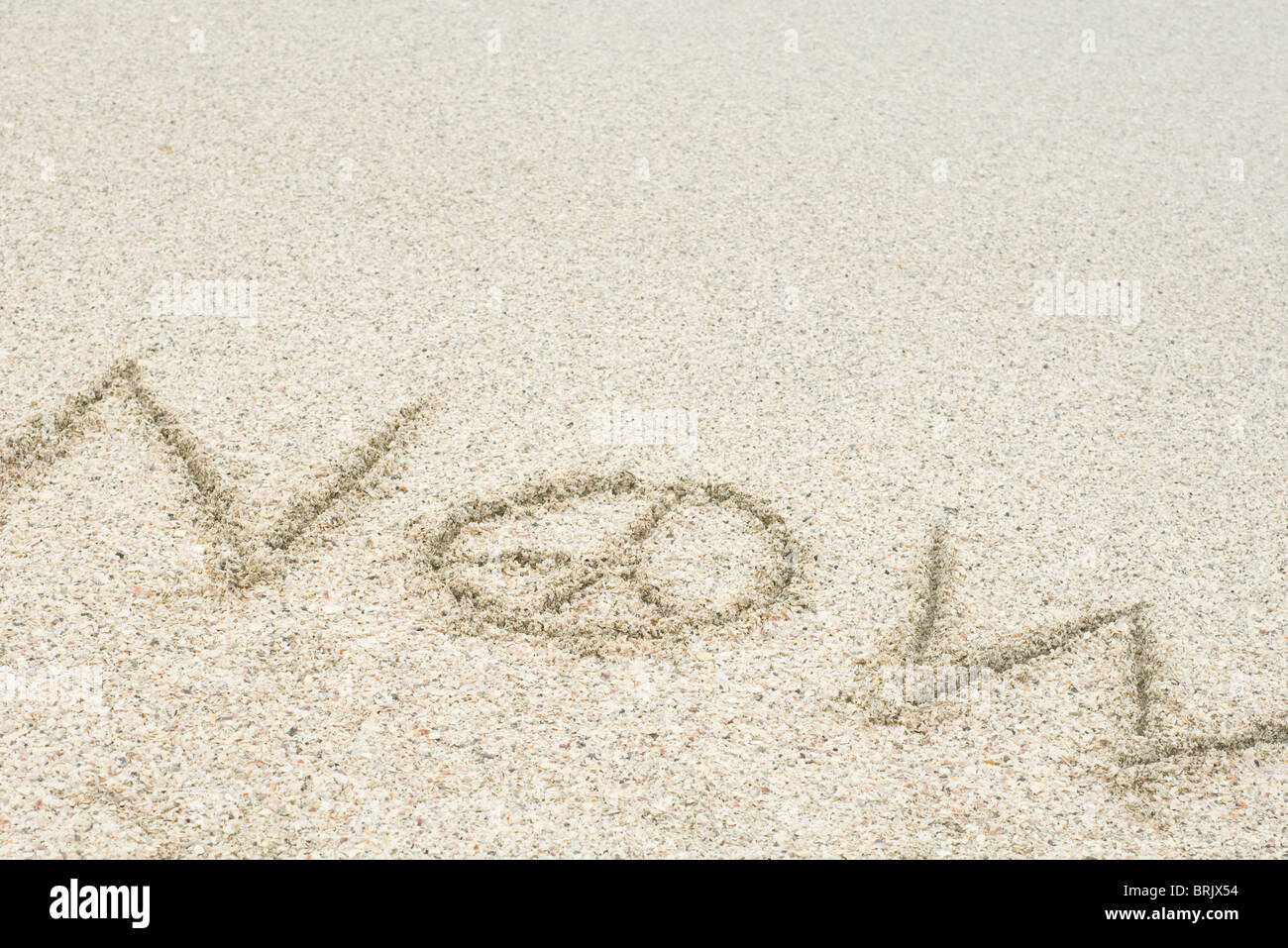 The word "now" written with a peace sign in sand (peace now Stock Photo ...