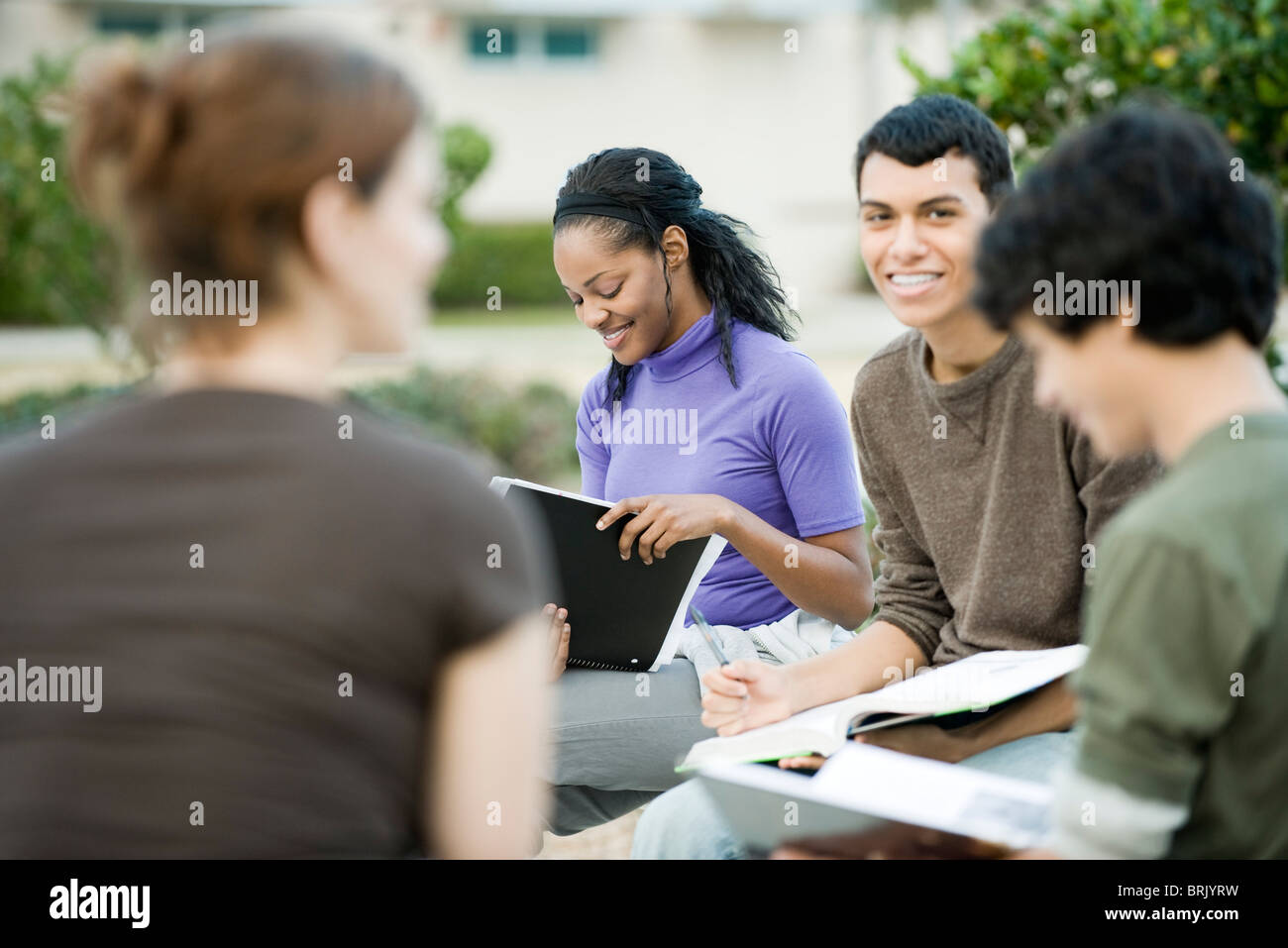 Students studying outdoors Stock Photo - Alamy