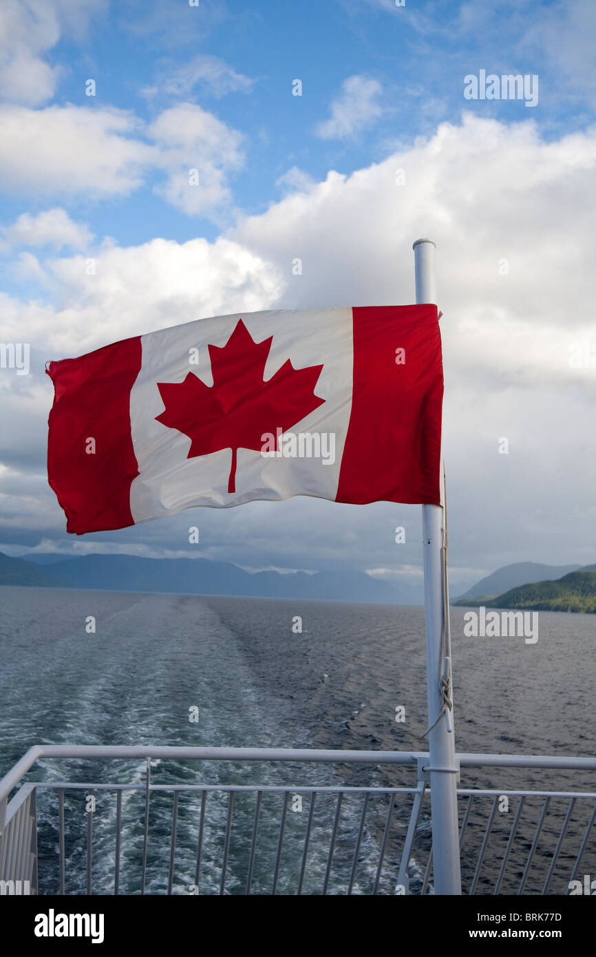 Canadian flag from stern of Inside Passage Ferry, British Columbia Sept ...