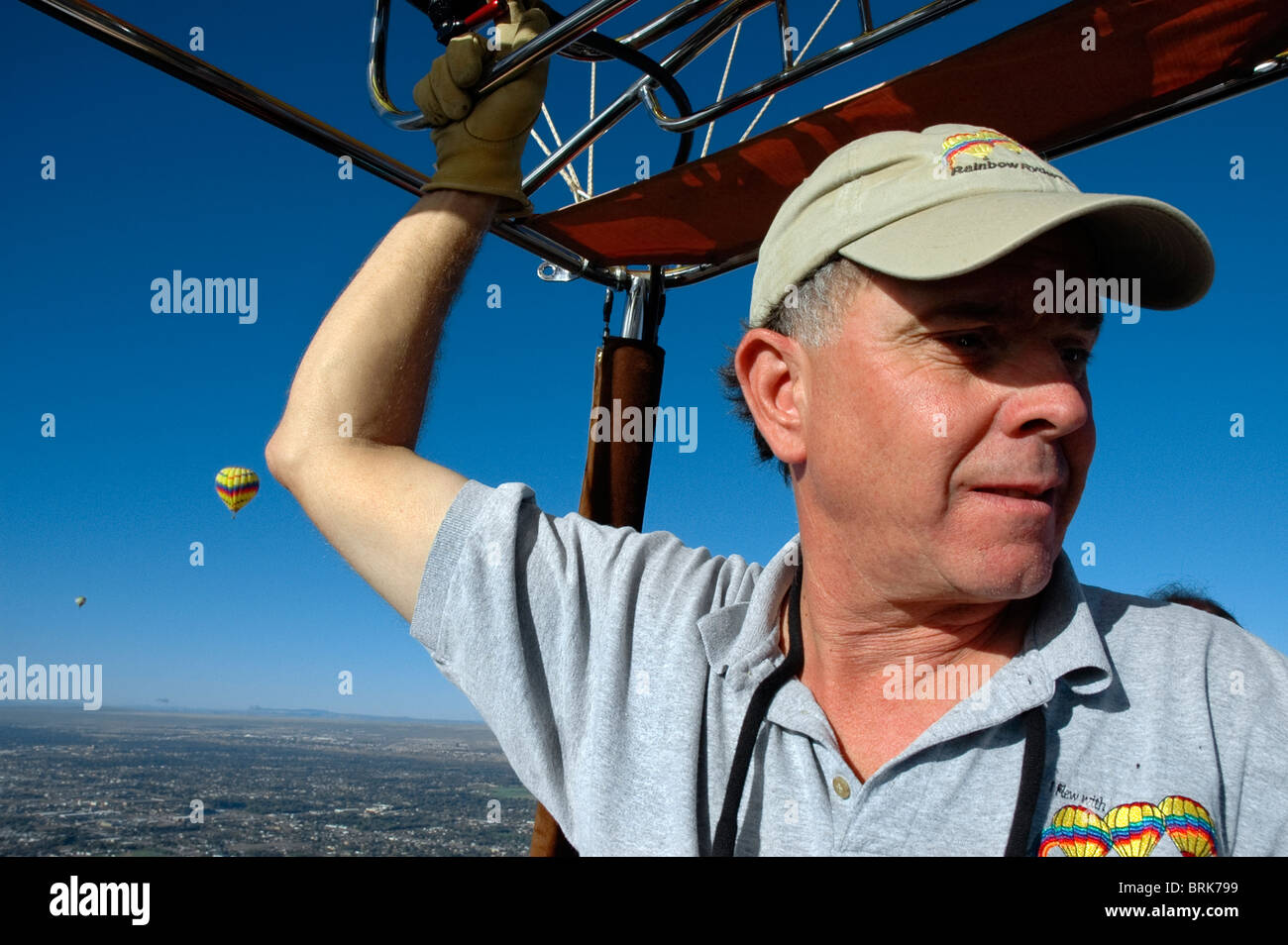 hot air balloon pilot Mike Collins floats over Albuquerque, NM Stock ...