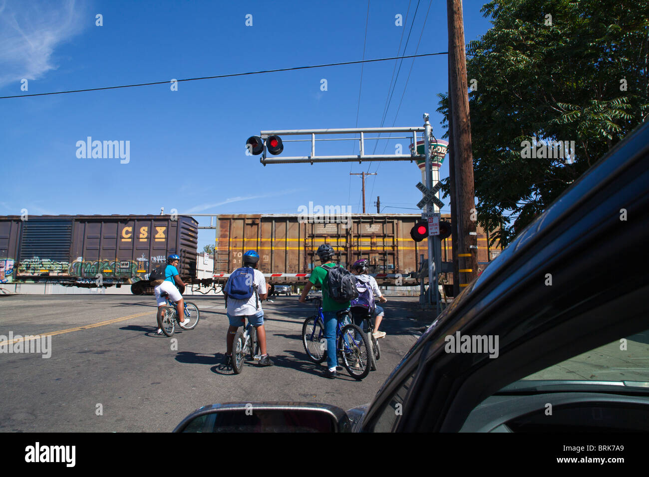 School children waiting for a freight train in Lodi California Stock ...