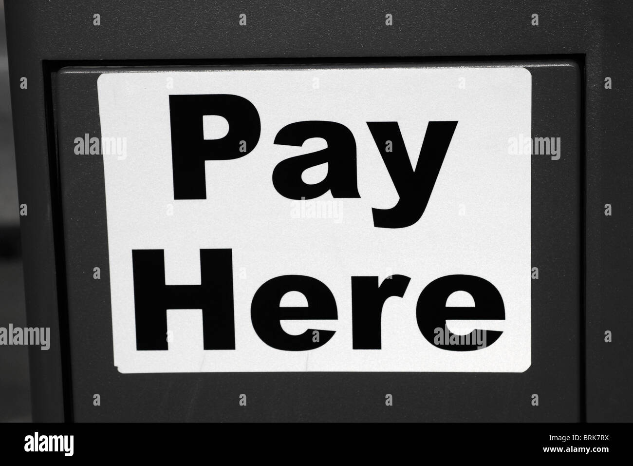 Sign at parking area demanding payment Stock Photo - Alamy