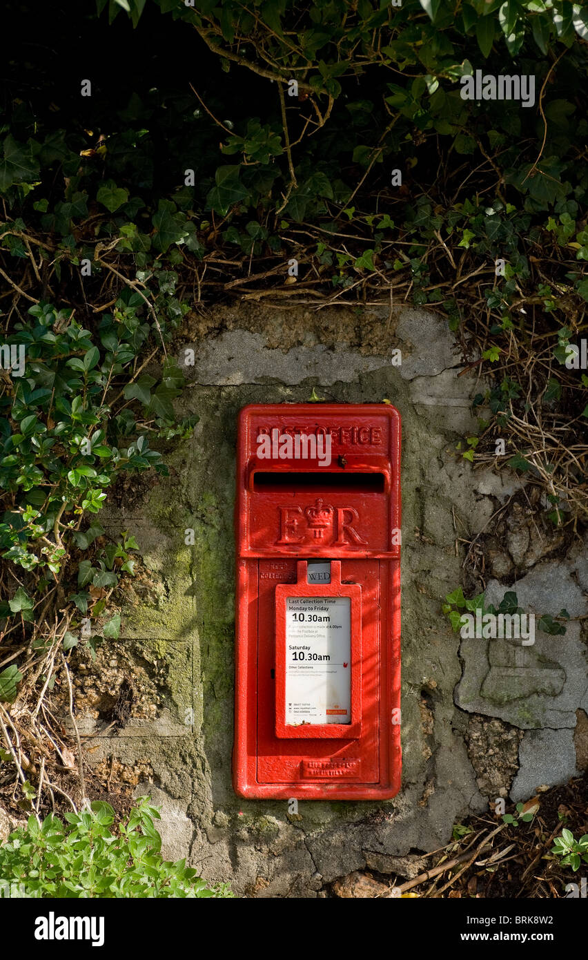 A traditional British post box set into a wall Stock Photo - Alamy