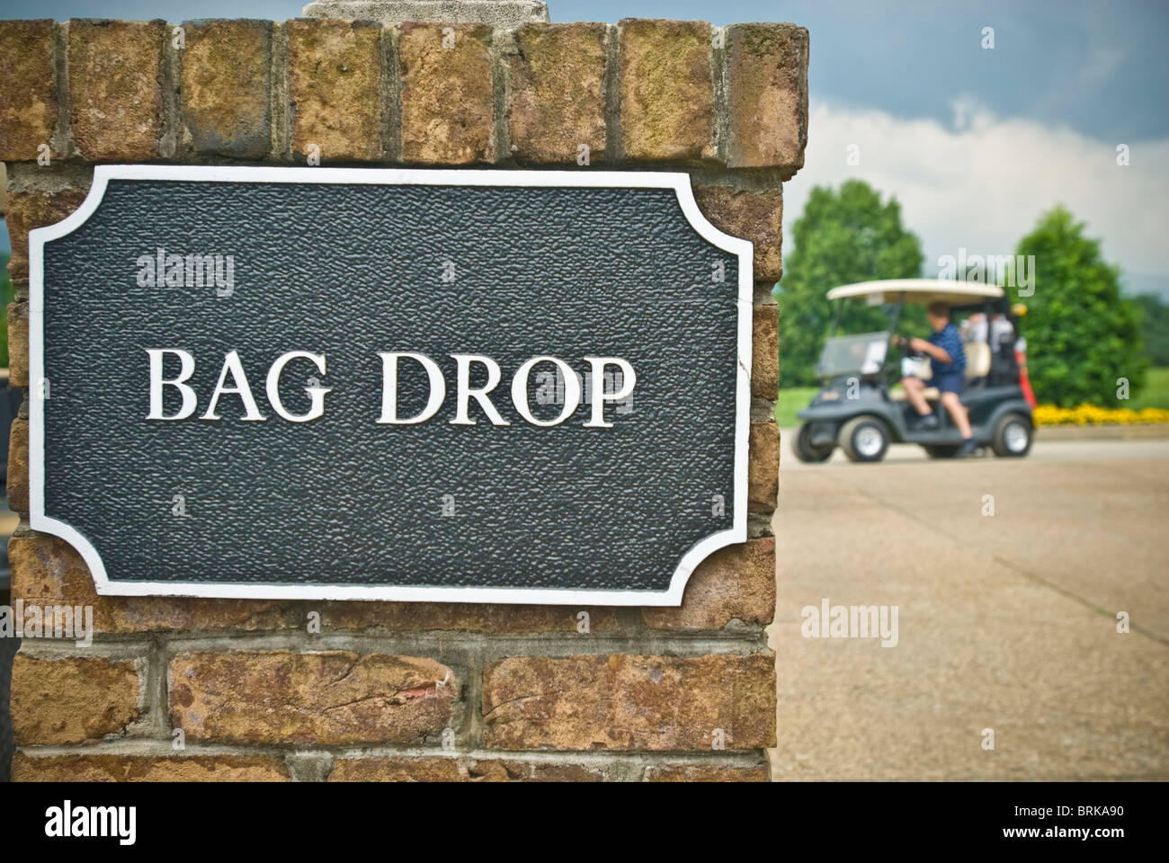 Bag drop off sign at country club course Stock Photo - Alamy
