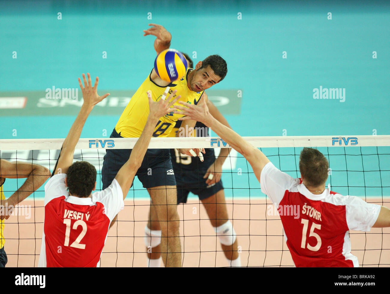 AMARAL Dante Guimaraes of Brazil spikes the ball trought the Czech's ...