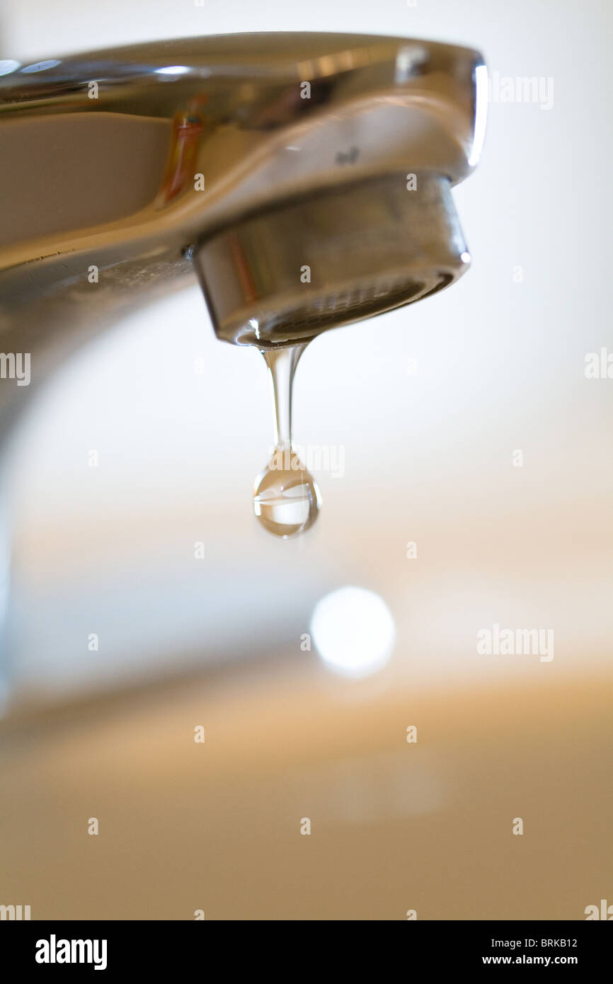 water Faucet /tap and Running Water close up shot Stock Photo - Alamy