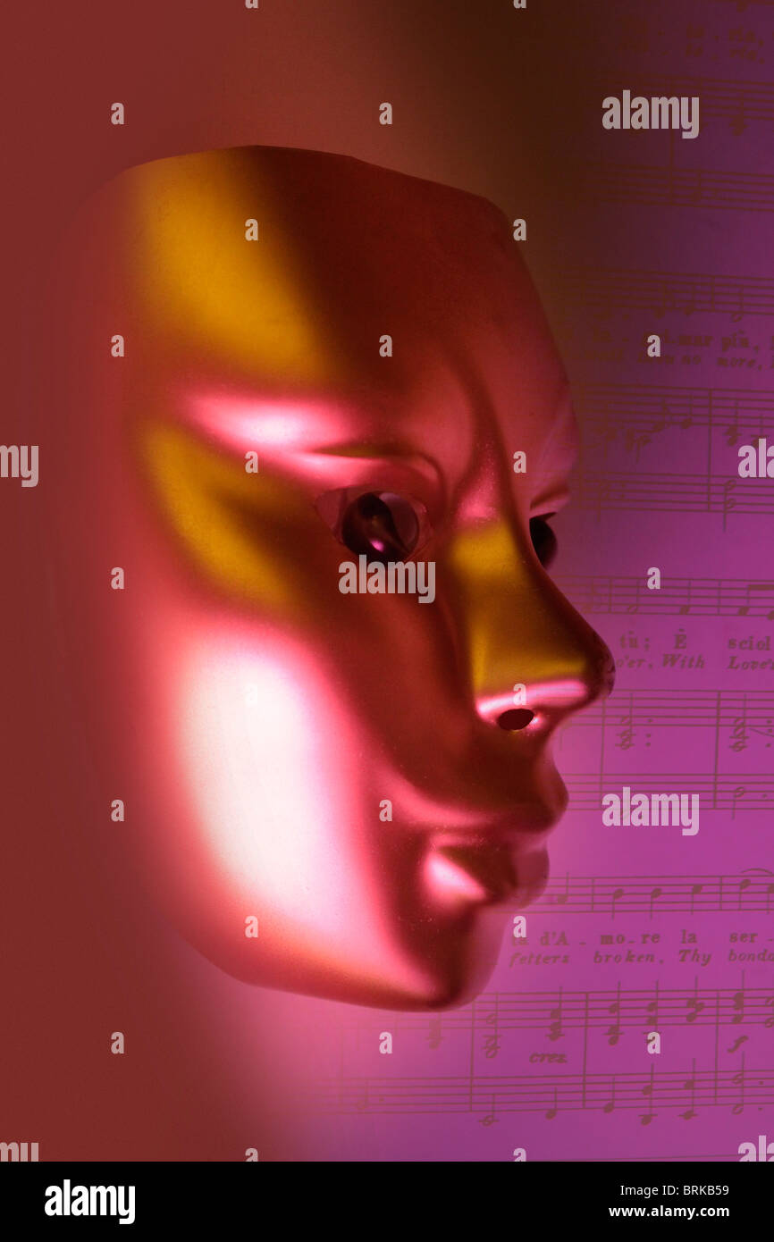 Mask and music montage Stock Photo - Alamy