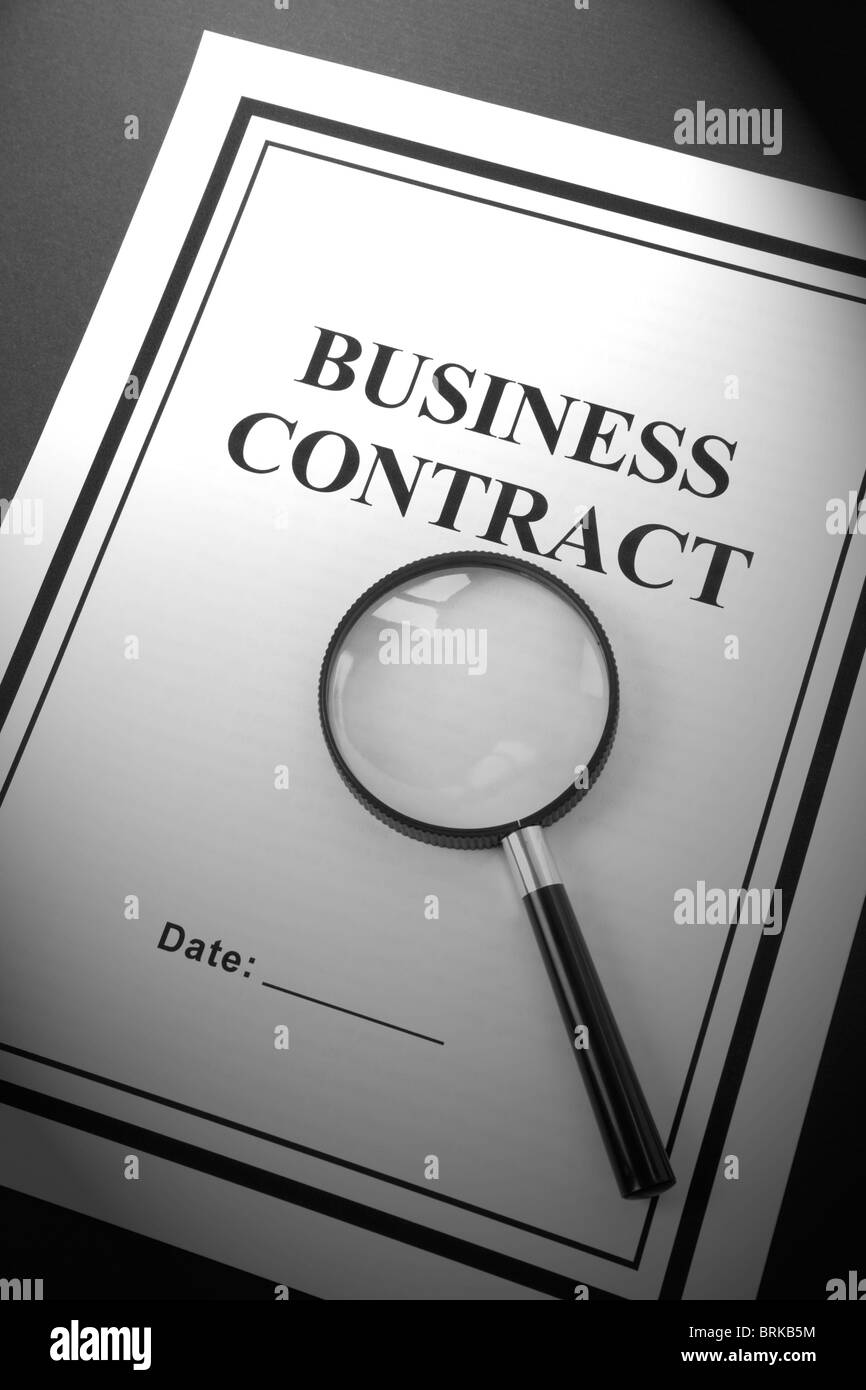Business Contract and Magnifying Glass, business concept Stock Photo ...