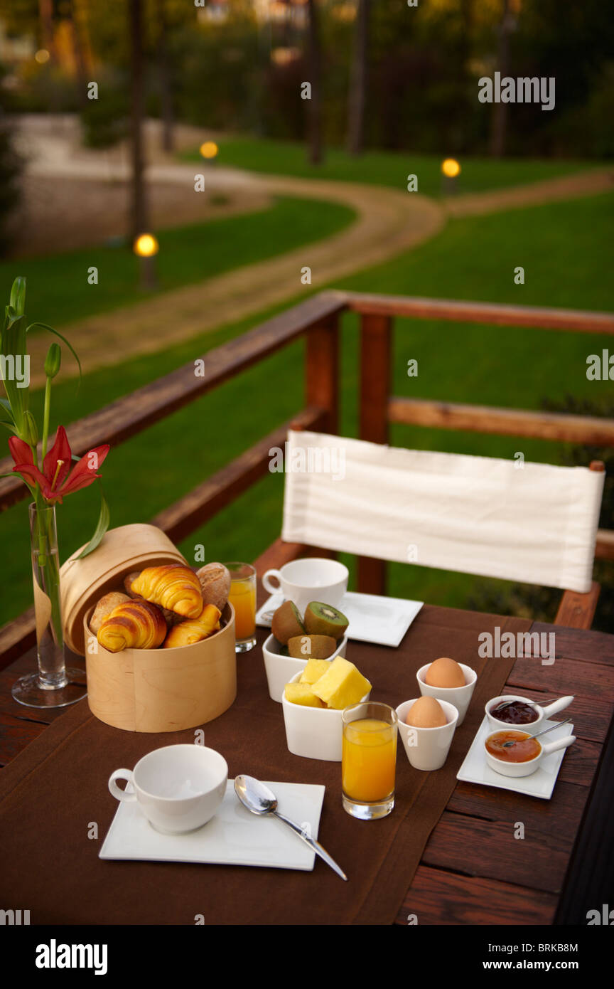 Breakfast on a balcony overseeing the woods Stock Photo - Alamy