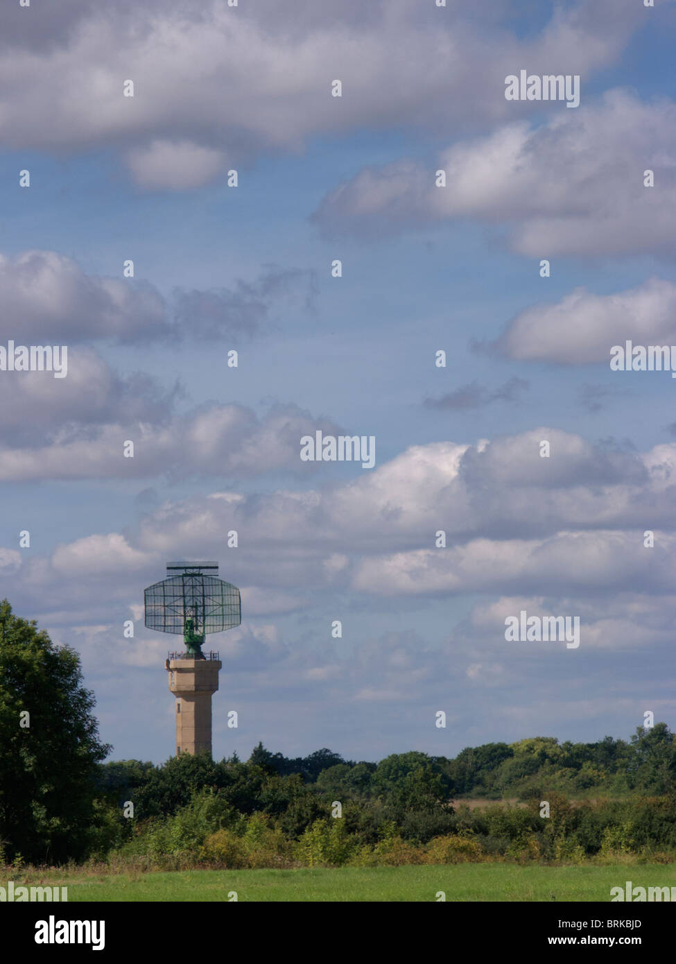 radar tower in a landscape tree all around with blue sky Stock Photo ...