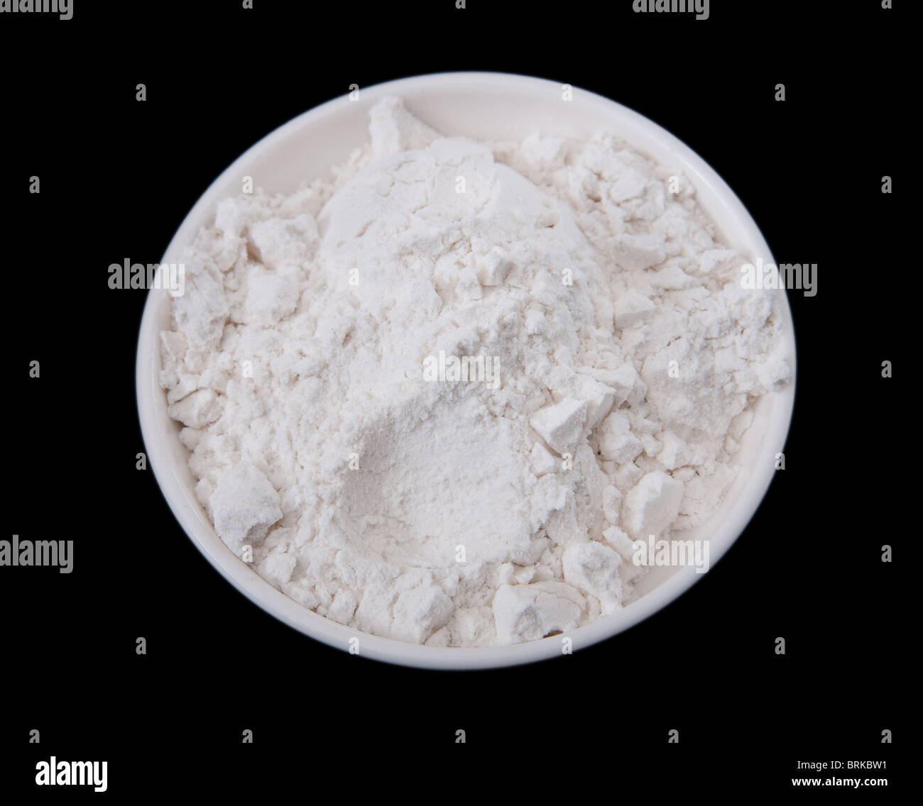 one small prep bowl full of fluffy white flour for cooking Stock Photo ...