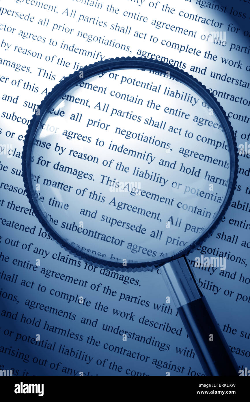 Magnifying Glass and document close up Stock Photo - Alamy