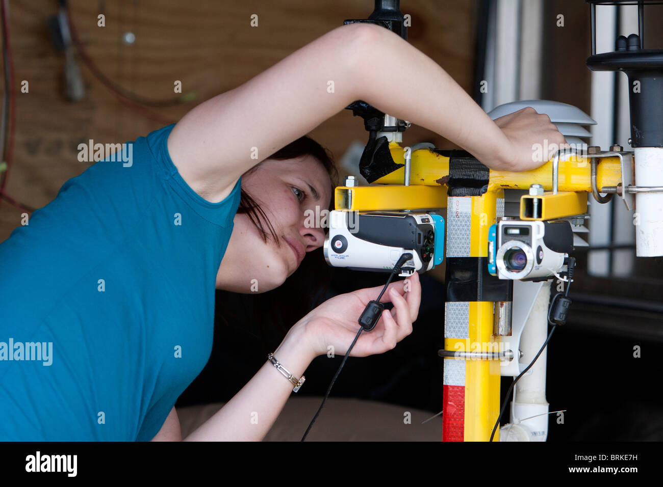 Lindsay Bennett, a scientist working with Project Vortex 2, adjusts a ...